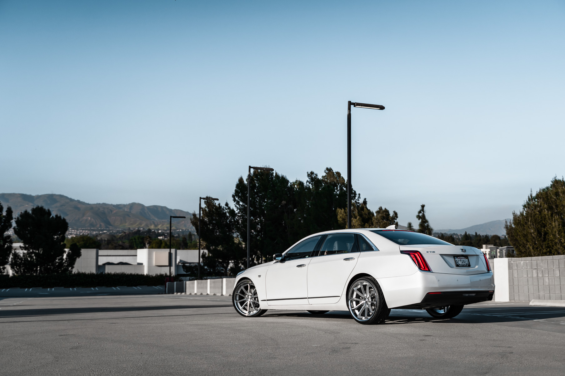 A 2016 Cadillac CT6 on Blaque Diamond BD-23 Silver Machined with Chrome ...
