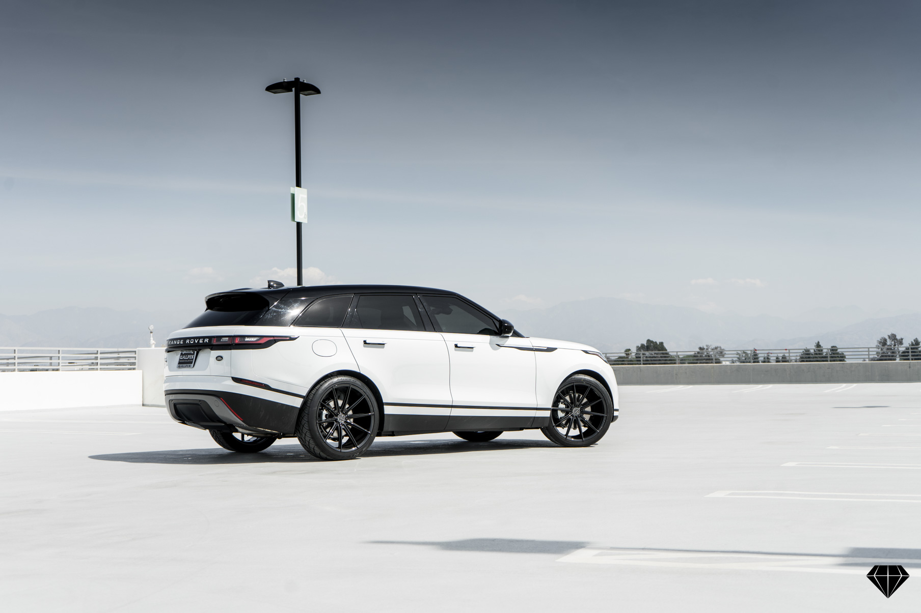 A 2018 Range Rover Velar on 22 Inch Blaque Diamond BD-11 Gloss Black ...