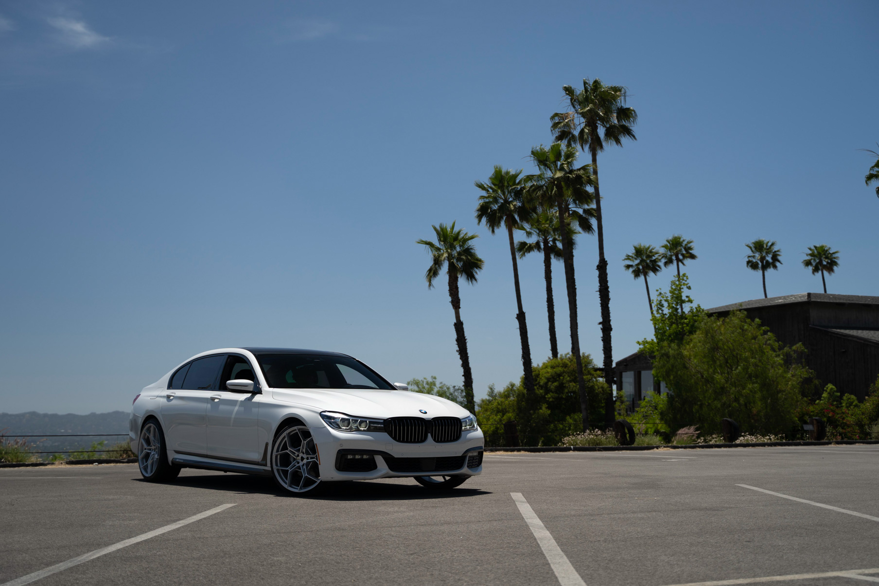 A 2020 BMW 7 Series on Blaque Diamond BD-F25 Brushed Silver Wheels ...