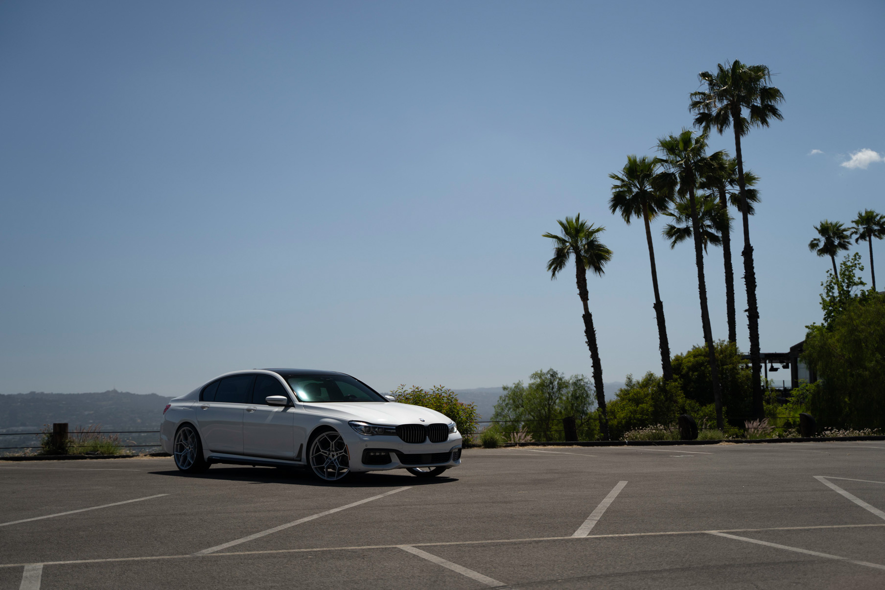 A 2020 BMW 7 Series on Blaque Diamond BD-F25 Brushed Silver Wheels ...