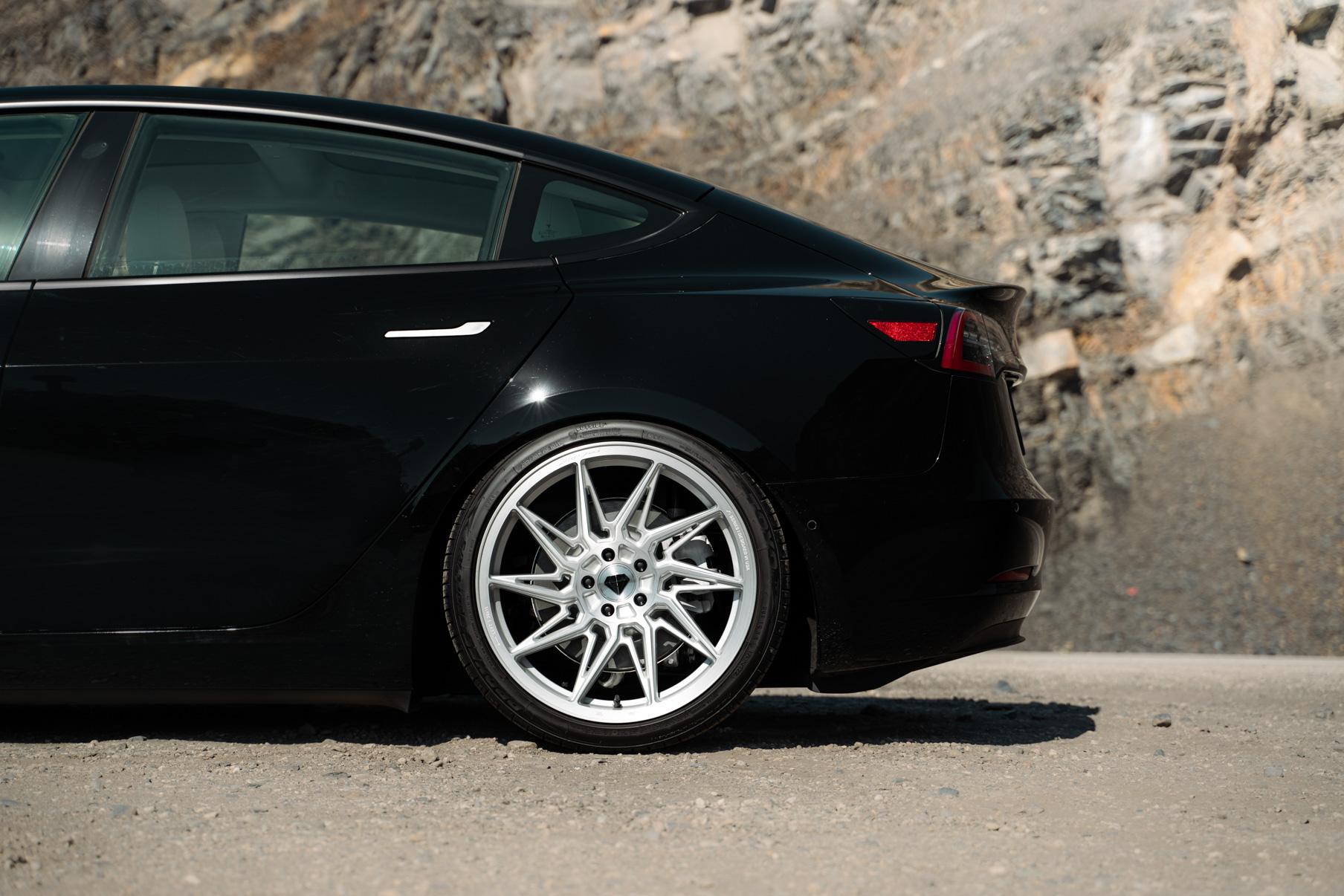 A 2022 Tesla Model 3 on Blaque Diamond BD-F20 Brushed Silver Wheels ...