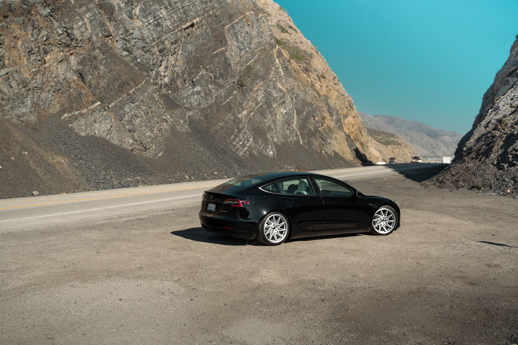 A 2022 Tesla Model 3 on Blaque Diamond BD-F20 Brushed Silver Wheels ...