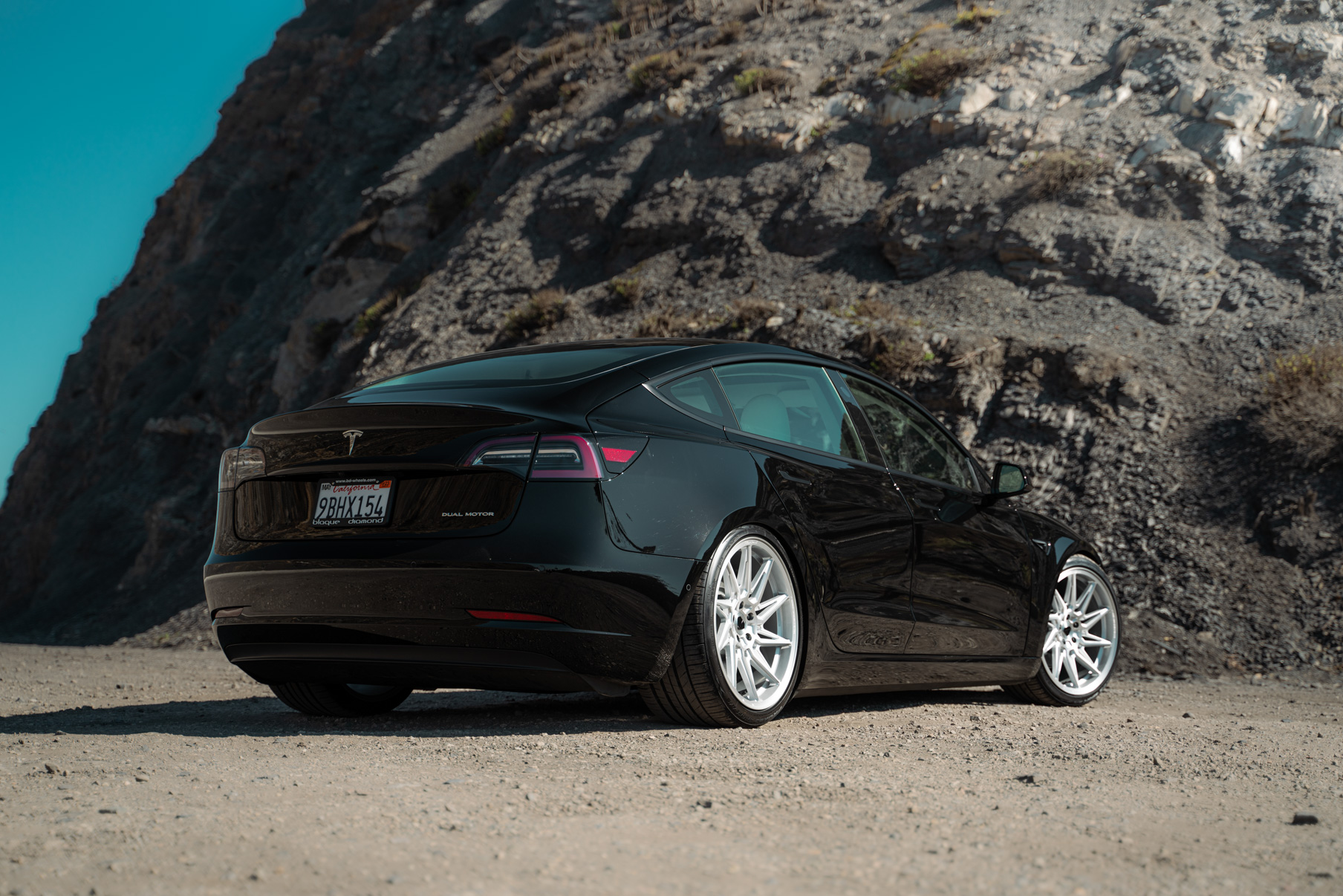A 2022 Tesla Model 3 on Blaque Diamond BD-F20 Brushed Silver Wheels ...