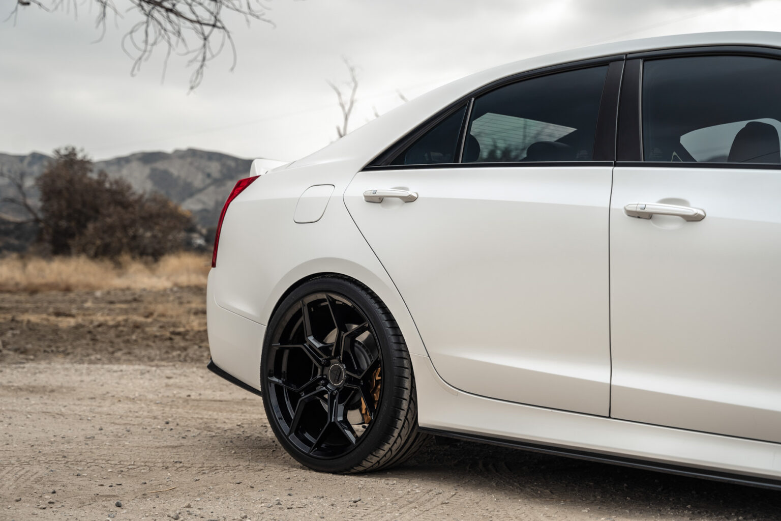 A 2018 Cadillac ATS V Coupe on Blaque Diamond BD-F25 Gloss Black Wheels ...
