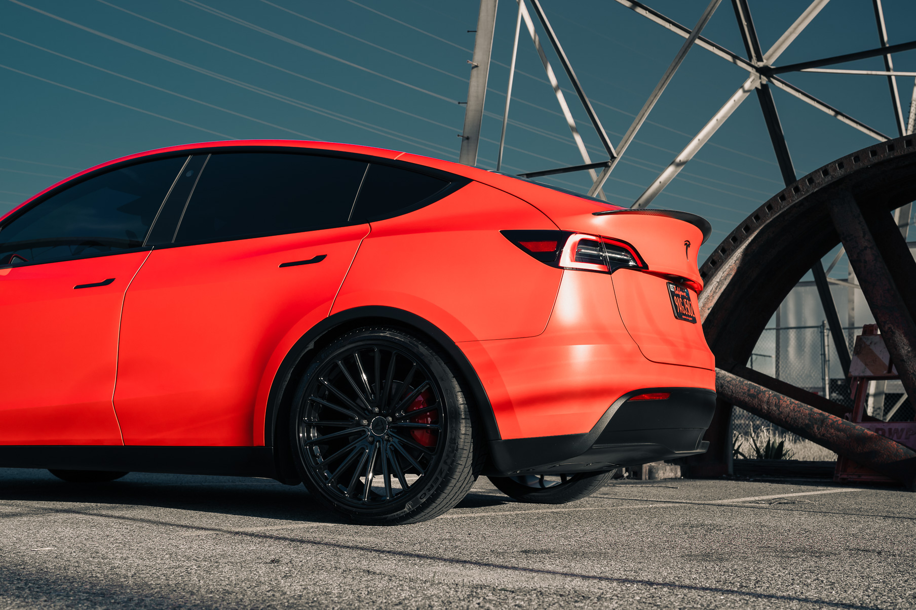 A Matte Red Tesla Model Y on Blaque Diamond BD-715 Gloss Black Wheels ...