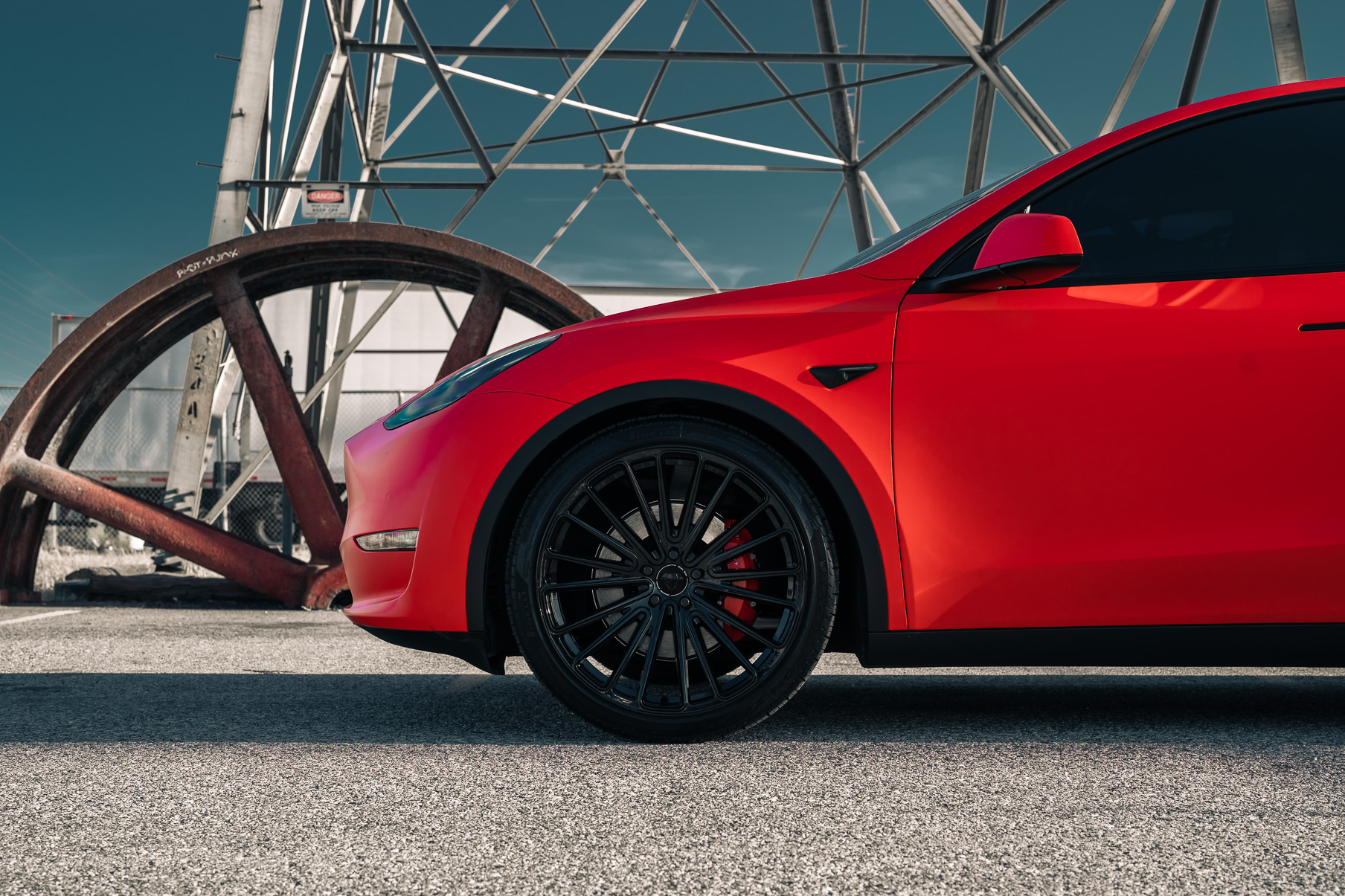 A Matte Red Tesla Model Y on Blaque Diamond BD-715 Gloss Black Wheels ...
